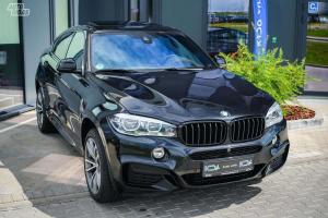 Black BMW X6 2017 in Kaunas, with an engine capacity of 3.00 L and mileage of 147 thousand km for 31950 €, photo 4 on AUTOMOTO.COM.LV