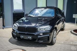 Black BMW X6 2017 in Kaunas, with an engine capacity of 3.00 L and mileage of 147 thousand km for 31950 €, photo 6 on AUTOMOTO.COM.LV