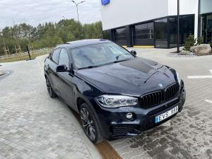 Black BMW X6 2017 in Vilnius, with an engine capacity of 2.99 L and mileage of 228 thousand km for 25600 €, photo 4 on AUTOMOTO.COM.LV