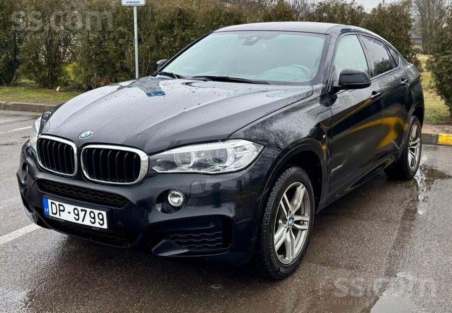 Black BMW X6 2018 in Riga, with an engine capacity of 3.00 L and mileage of 120 thousand km for 15500 €, photo 3 on AUTOMOTO.COM.LV