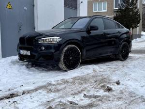 Black BMW X6 2018 in Vilnius, with an engine capacity of 2.99 L and mileage of 182 thousand km for 29999 €, photo 16 on AUTOMOTO.COM.LV
