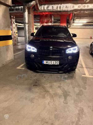 Black BMW X6 2018 in Vilnius, with an engine capacity of 2.99 L and mileage of 182 thousand km for 29999 €, photo 21 on AUTOMOTO.COM.LV