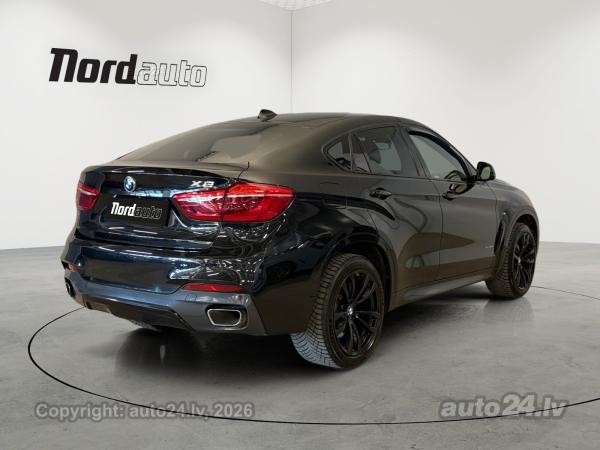 Black BMW X6 2018 in Tallinn, with an engine capacity of 3.00 L and mileage of 188 thousand km for 29900 €, photo 2 on AUTOMOTO.COM.LV