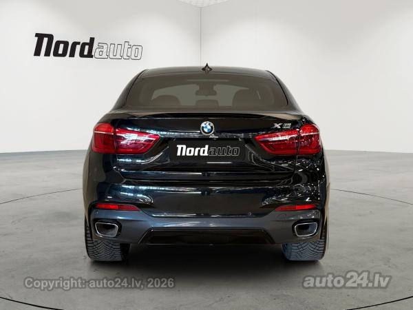 Black BMW X6 2018 in Tallinn, with an engine capacity of 3.00 L and mileage of 188 thousand km for 29900 €, photo 4 on AUTOMOTO.COM.LV