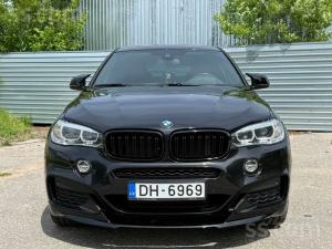 Black BMW X6 2018 in Riga, with an engine capacity of 3.00 L and mileage of 137 thousand km for 29699 €, photo 3 on AUTOMOTO.COM.LV