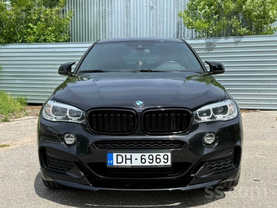 Black BMW X6 2018 in Riga, with an engine capacity of 3.00 L and mileage of 137 thousand km for 29699 €, photo 3 on AUTOMOTO.COM.LV