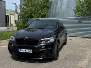 Black BMW X6 2018 in Riga, with an engine capacity of 3.00 L and mileage of 137 thousand km for 29699 €, photo 5 on AUTOMOTO.COM.LV