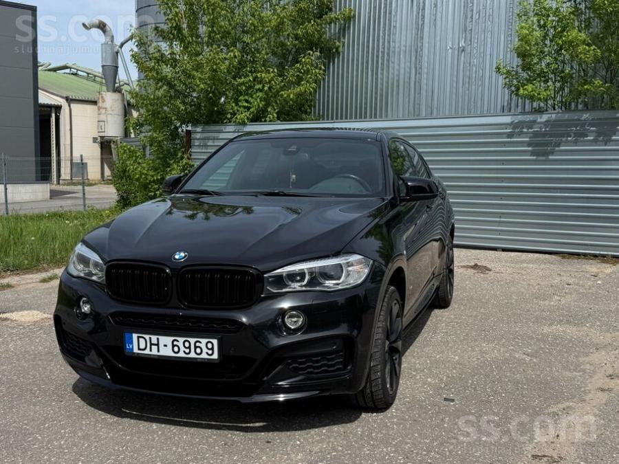 Black BMW X6 2018 in Riga, with an engine capacity of 3.00 L and mileage of 137 thousand km for 29699 €, photo 5 on AUTOMOTO.COM.LV