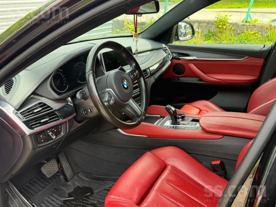Black BMW X6 2018 in Riga, with an engine capacity of 3.00 L and mileage of 137 thousand km for 29699 €, photo 14 on AUTOMOTO.COM.LV