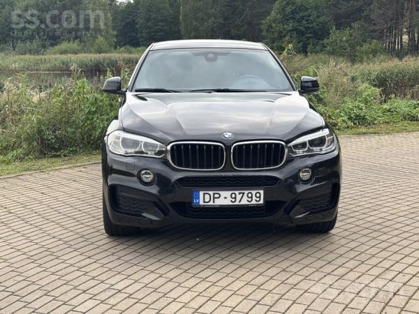 Melns BMW X6 2018 Rīga, ar dzinēja tilpumu 3.00 L un nobraukumu 127 tūkst. km par 31999 €, foto 1 vietnē AUTOMOTO.COM.LV