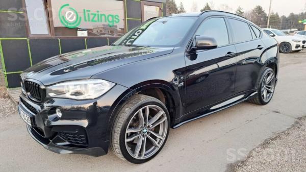 Black BMW X6 2018 in Riga, with an engine capacity of 3.00 L and mileage of 257 thousand km for 25900 €, photo 1 on AUTOMOTO.COM.LV