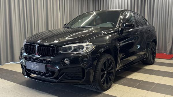 Black BMW X6 2018 in Riga, with an engine capacity of 3.00 L and mileage of 137 thousand km for 27990 €, photo 2 on AUTOMOTO.COM.LV