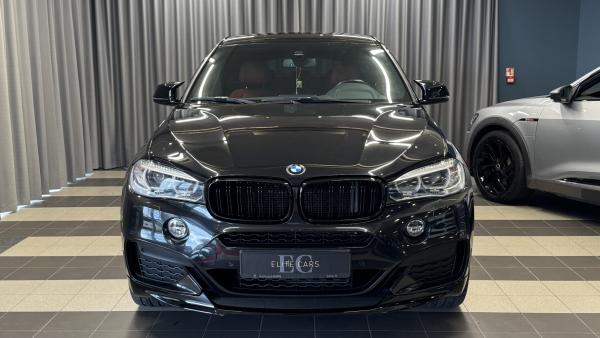 Black BMW X6 2018 in Riga, with an engine capacity of 3.00 L and mileage of 137 thousand km for 27990 €, photo 4 on AUTOMOTO.COM.LV