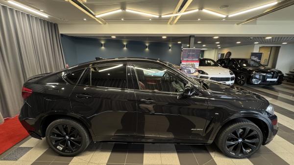 Black BMW X6 2018 in Riga, with an engine capacity of 3.00 L and mileage of 137 thousand km for 27990 €, photo 7 on AUTOMOTO.COM.LV