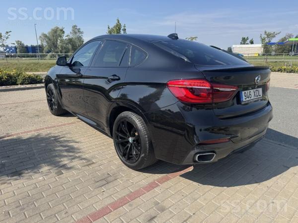 Black BMW X6 2018 in Bauska, with an engine capacity of 3.00 L and mileage of 0 thousand km for 19990 €, photo 3 on AUTOMOTO.COM.LV