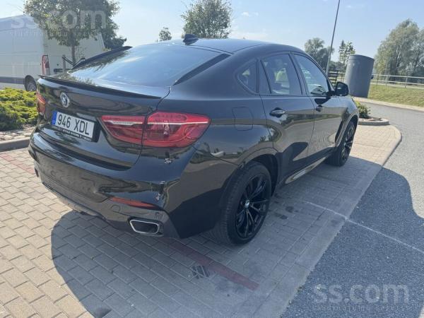 Black BMW X6 2018 in Bauska, with an engine capacity of 3.00 L and mileage of 0 thousand km for 19990 €, photo 5 on AUTOMOTO.COM.LV