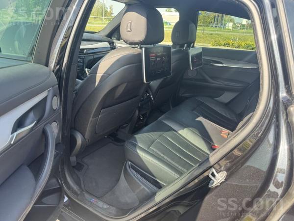 Black BMW X6 2018 in Bauska, with an engine capacity of 3.00 L and mileage of 0 thousand km for 19990 €, photo 7 on AUTOMOTO.COM.LV