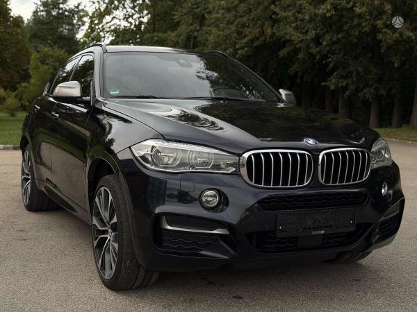Black BMW X6 2018 in Rokiskis, with an engine capacity of 2.99 L and mileage of 270 thousand km for 19850 €, photo 4 on AUTOMOTO.COM.LV