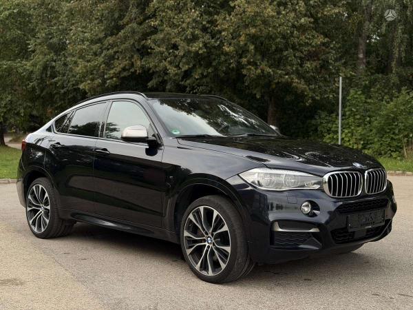 Black BMW X6 2018 in Rokiskis, with an engine capacity of 2.99 L and mileage of 270 thousand km for 19850 €, photo 11 on AUTOMOTO.COM.LV