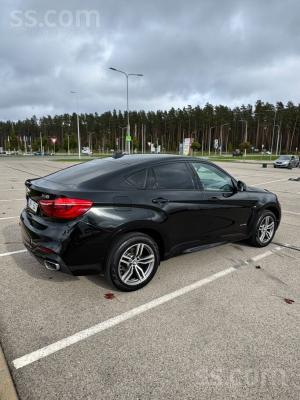Melns BMW X6 2018 Rīga, ar dzinēja tilpumu 3.00 L un nobraukumu 150 tūkst. km par 27900 €, foto  vietnē AUTOMOTO.COM.LV