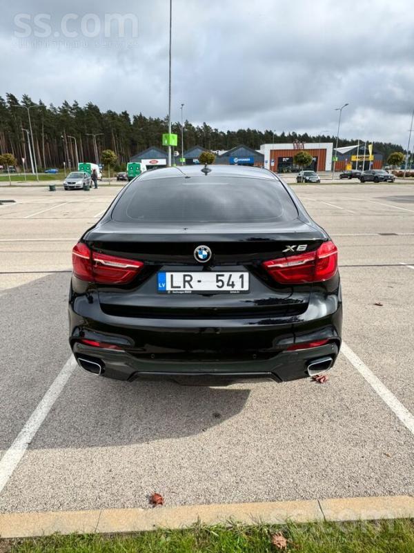 BMW X6 2018 in Riga on AUTOMOTO.COM.LV Black BMW X6 2018 in Riga, with an engine capacity of 3.00 L and mileage of 150 thousand km for 27900 €, photo 3 on AUTOMOTO.COM.LV