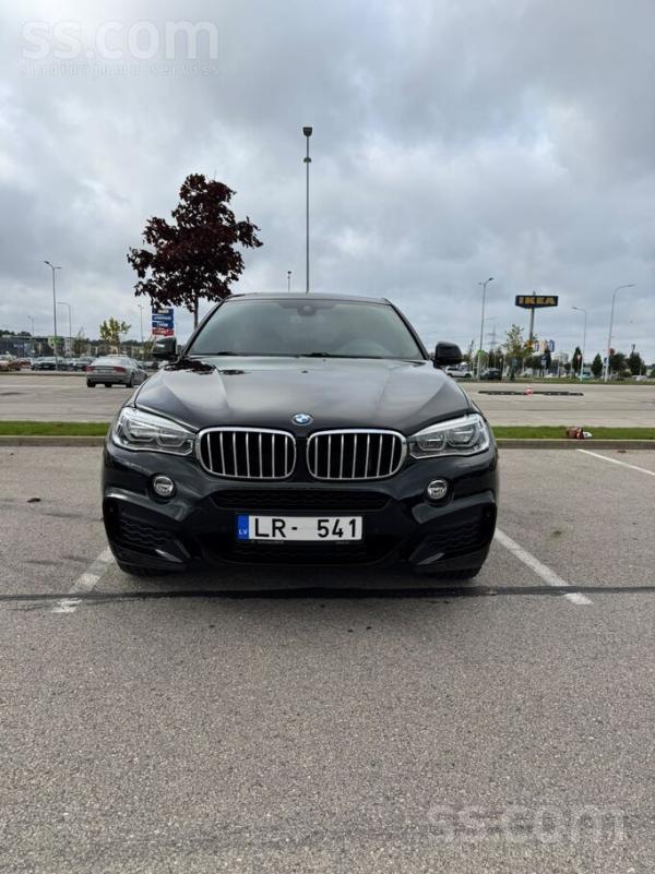 BMW X6 2018 in Riga on AUTOMOTO.COM.LV Black BMW X6 2018 in Riga, with an engine capacity of 3.00 L and mileage of 150 thousand km for 27900 €, photo 5 on AUTOMOTO.COM.LV