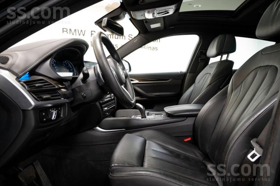 Black BMW X6 2019 in Riga, with an engine capacity of 3.00 L and mileage of 208 thousand km for 28900 €, photo 6 on AUTOMOTO.COM.LV