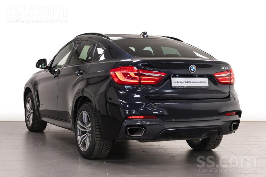 Black BMW X6 2019 in Riga, with an engine capacity of 3.00 L and mileage of 208 thousand km for 28900 €, photo 12 on AUTOMOTO.COM.LV