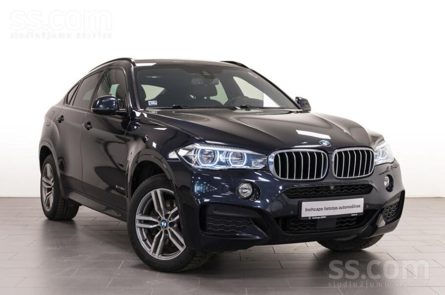 Black BMW X6 2019 in Riga, with an engine capacity of 3.00 L and mileage of 208 thousand km for 28900 €, photo 13 on AUTOMOTO.COM.LV