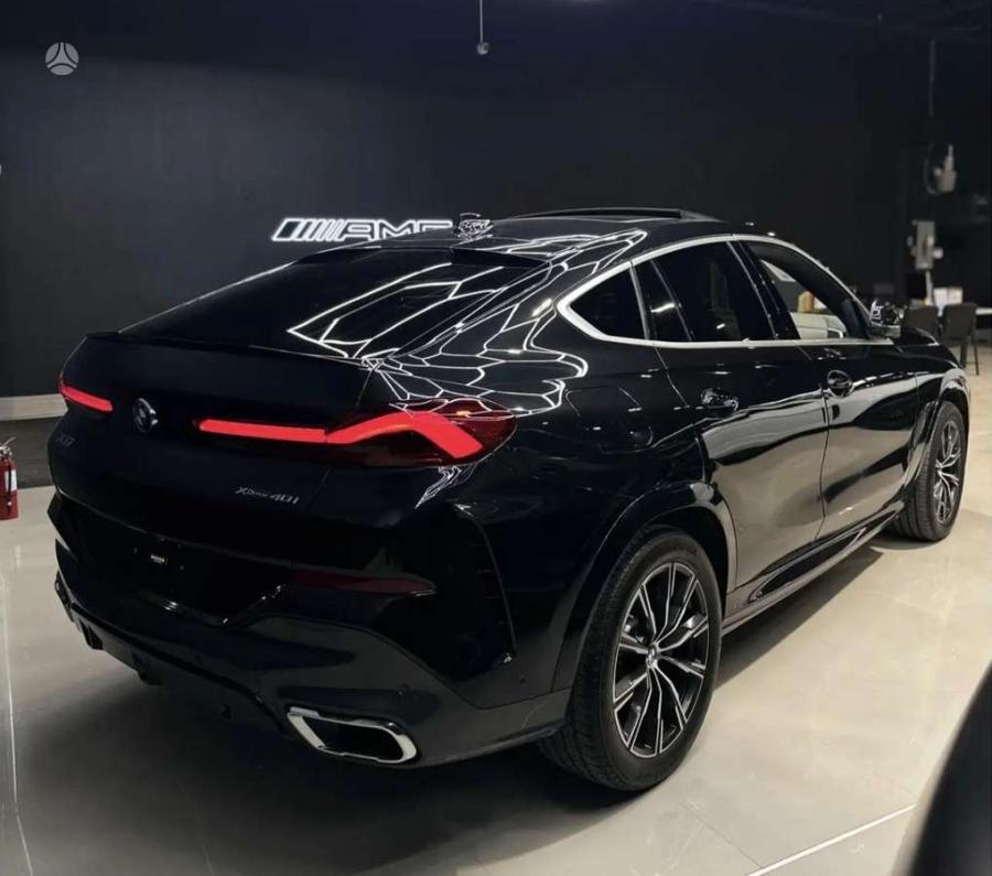 Black BMW X6 2019 in Klaipeda, with an engine capacity of 3.00 L and mileage of 144 thousand km for 54600 €, photo 4 on AUTOMOTO.COM.LV