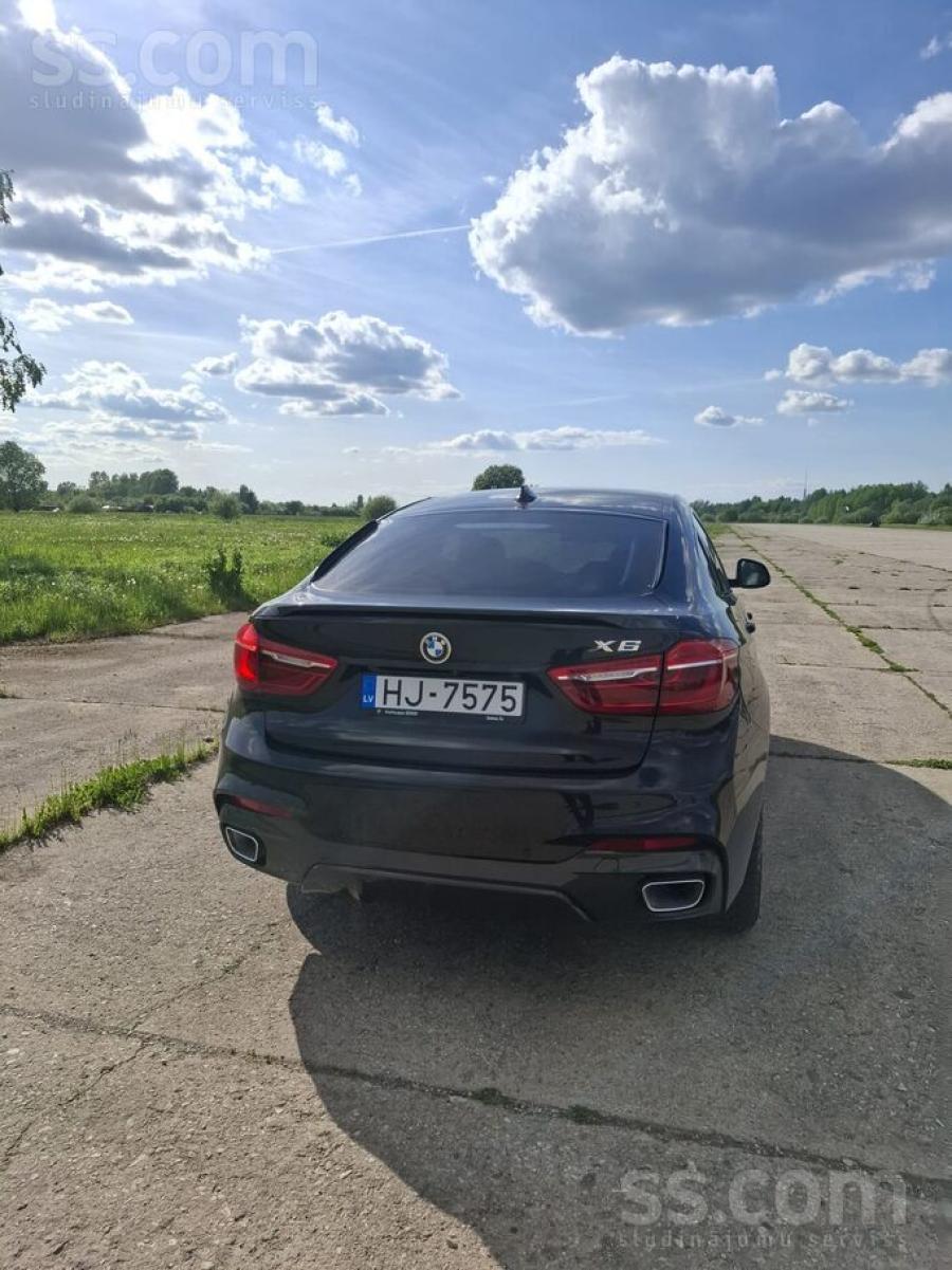 Black BMW X6 2019 in Riga, with an engine capacity of 3.00 L and mileage of 149 thousand km for 32750 €, photo 3 on AUTOMOTO.COM.LV