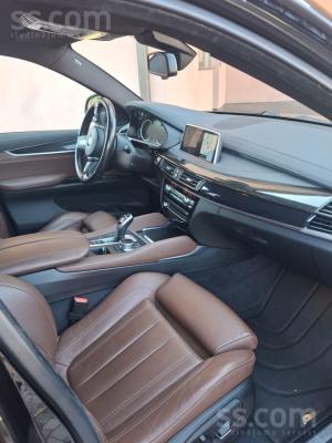 Black BMW X6 2019 in Riga, with an engine capacity of 3.00 L and mileage of 149 thousand km for 32750 €, photo 12 on AUTOMOTO.COM.LV