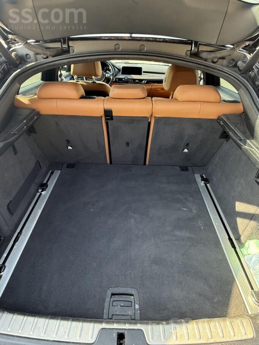 Black BMW X6 2019 in Riga, with an engine capacity of 3.00 L and mileage of 103 thousand km for 36500 €, photo 11 on AUTOMOTO.COM.LV