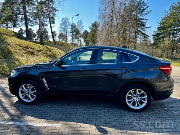 Black BMW X6 2019 in Riga, with an engine capacity of 3.00 L and mileage of 67 thousand km for 31500 €, photo 3 on AUTOMOTO.COM.LV