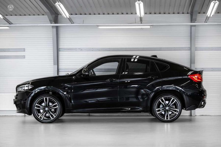 Black BMW X6 2019 in Tukums, with an engine capacity of 2.99 L and mileage of 233 thousand km for 25990 €, photo 8 on AUTOMOTO.COM.LV