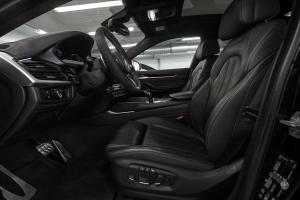 Black BMW X6 2019 in Tukums, with an engine capacity of 2.99 L and mileage of 233 thousand km for 25990 €, photo 13 on AUTOMOTO.COM.LV