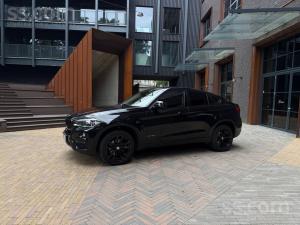 Black BMW X6 2019 in Riga, with an engine capacity of 3.00 L and mileage of 139 thousand km for 26200 €, photo  on AUTOMOTO.COM.LV