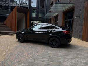 Melns BMW X6 2019 Rīga, ar dzinēja tilpumu 3.00 L un nobraukumu 139 tūkst. km par 26200 €, foto 6 vietnē AUTOMOTO.COM.LV