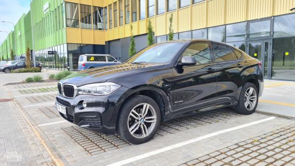 Black BMW X6 2019 in Vilnius, with an engine capacity of 3.00 L and mileage of 194 thousand km for 31900 €, photo 1 on AUTOMOTO.COM.LV