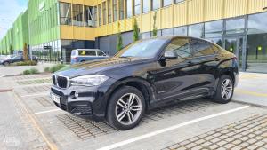 Black BMW X6 2019 in Vilnius, with an engine capacity of 3.00 L and mileage of 194 thousand km for 31900 €, photo  on AUTOMOTO.COM.LV