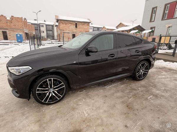 Black BMW X6 2020 in Kaunas, with an engine capacity of 3.00 L and mileage of 94 thousand km for 55000 €, photo 3 on AUTOMOTO.COM.LV
