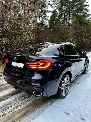 Black BMW X6 2020 in Kaunas, with an engine capacity of 3.00 L and mileage of 145 thousand km for 31000 €, photo 3 on AUTOMOTO.COM.LV