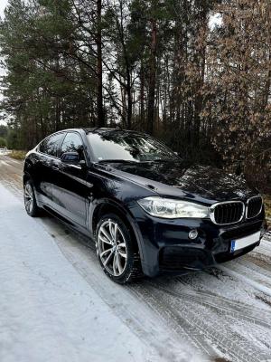 Black BMW X6 2020 in Kaunas, with an engine capacity of 3.00 L and mileage of 145 thousand km for 31000 €, photo 4 on AUTOMOTO.COM.LV