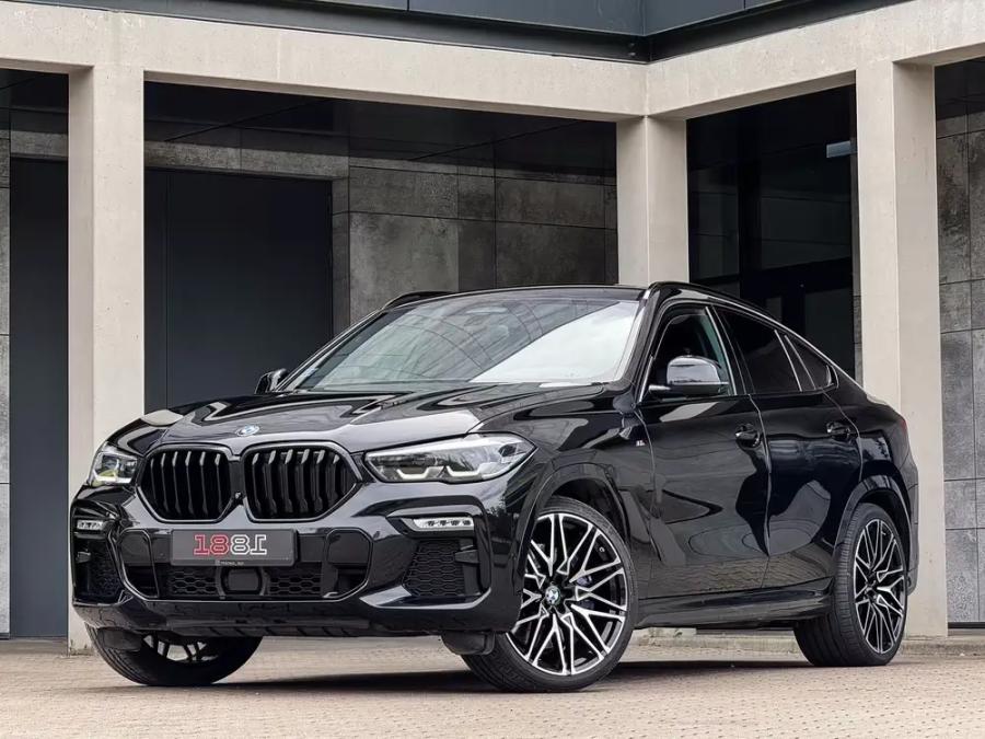Black BMW X6 2020 in Riga, with an engine capacity of 3.00 L and mileage of 92 thousand km for 55900 €, photo 4 on AUTOMOTO.COM.LV