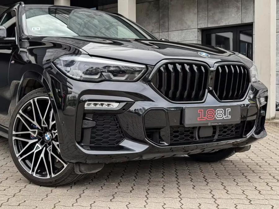 Black BMW X6 2020 in Riga, with an engine capacity of 3.00 L and mileage of 92 thousand km for 55900 €, photo 6 on AUTOMOTO.COM.LV