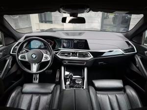 Black BMW X6 2020 in Riga, with an engine capacity of 3.00 L and mileage of 92 thousand km for 55900 €, photo 12 on AUTOMOTO.COM.LV