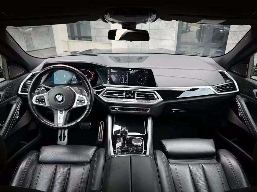 Black BMW X6 2020 in Riga, with an engine capacity of 3.00 L and mileage of 92 thousand km for 55900 €, photo 12 on AUTOMOTO.COM.LV