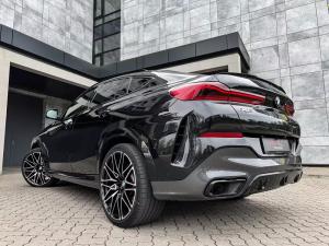 Black BMW X6 2020 in Riga, with an engine capacity of 3.00 L and mileage of 92 thousand km for 55900 €, photo 13 on AUTOMOTO.COM.LV