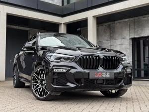 Black BMW X6 2020 in Riga, with an engine capacity of 3.00 L and mileage of 92 thousand km for 55900 €, photo 16 on AUTOMOTO.COM.LV