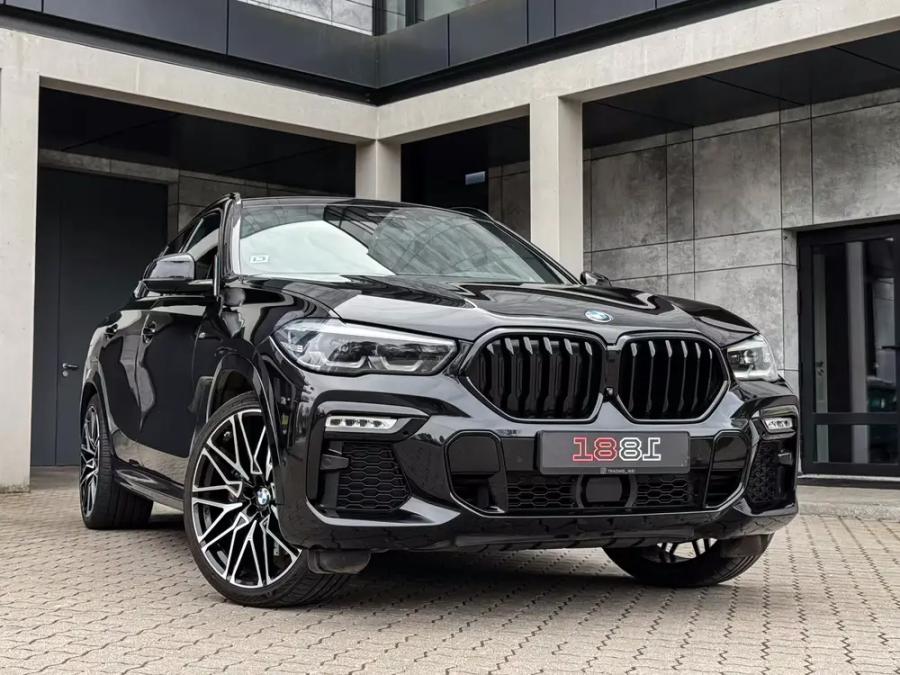 Black BMW X6 2020 in Riga, with an engine capacity of 3.00 L and mileage of 92 thousand km for 55900 €, photo 16 on AUTOMOTO.COM.LV